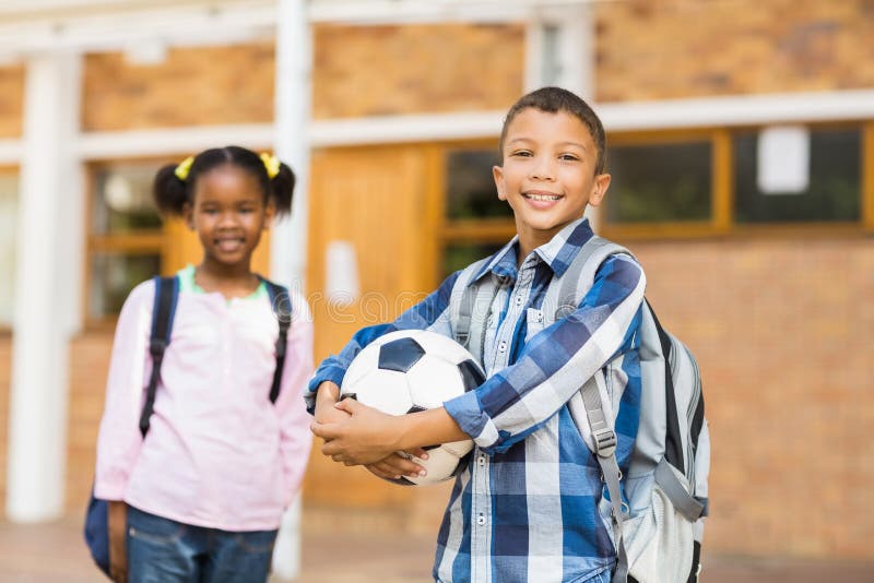 Smiling Kids Standing in Classroom at School Stock Photo - Image of ...