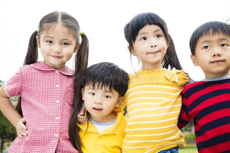 Smiling Kids Standing Outside Together Stock Image - Image of friends ...