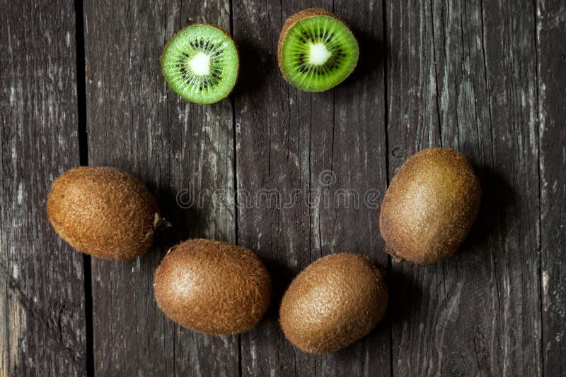 Smiling Kiwi Sliced and Whole Fruits Stock Photo - Image of color ...