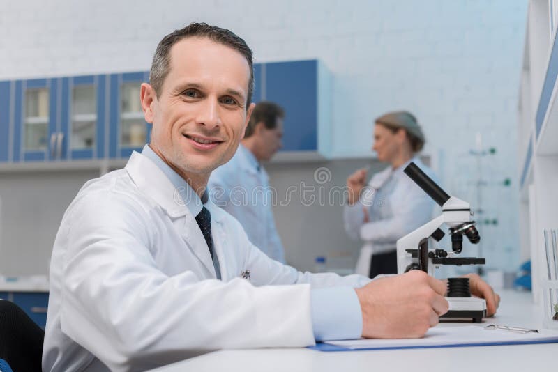 Lab Technician Taking Notes Stock Image - Image of write, researchers ...