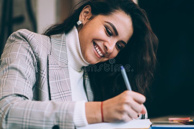 Smiling Lady Making Notes in Notepad Stock Photo - Image of education ...