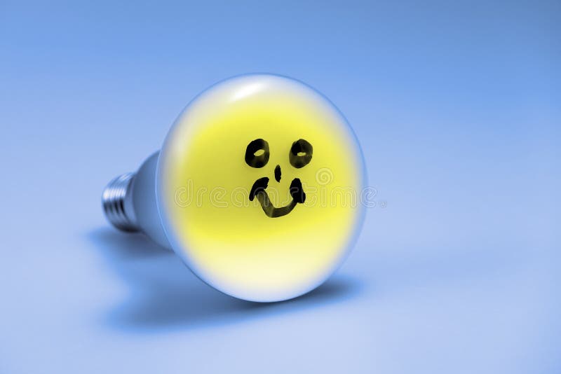 Smiling Light bulb stock photo. Image of glow, industrial - 23265854
