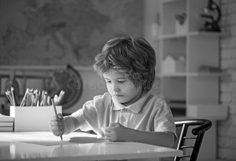 Smiling Little Boy Drawing in the Room. Stock Image - Image of ...
