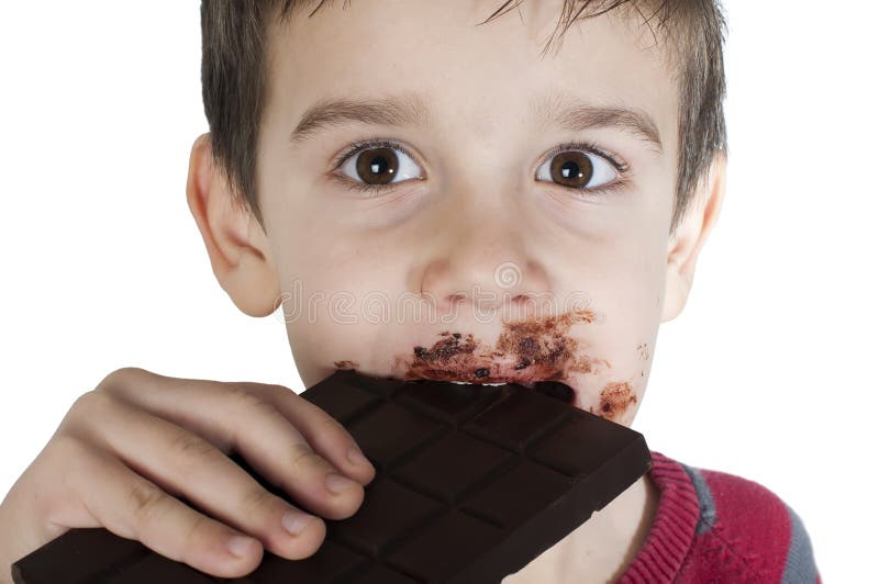 Smiling Little Boy Eating Chocolate Stock Photo - Image of brown, choco ...
