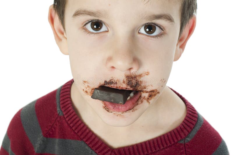 Smiling Kid Eating Chocolate Stock Photo - Image of face, chopped: 28144048