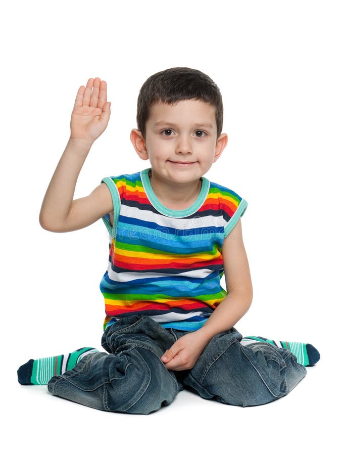 Smiling Little Boy Holding His Hand Up Stock Photo - Image of ...