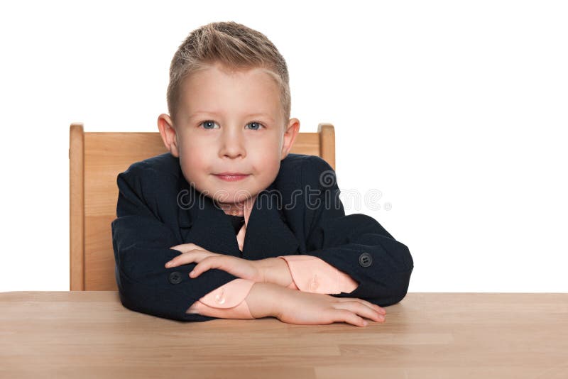 Little boy at the desk stock photo. Image of positivity - 29785626