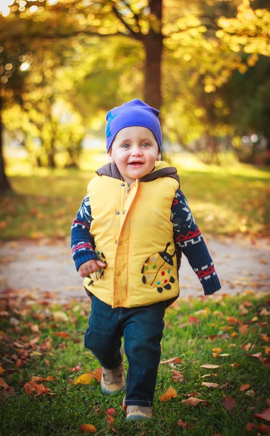 Smiling Little Child Running Stock Photo - Image of full, gamine: 51484120