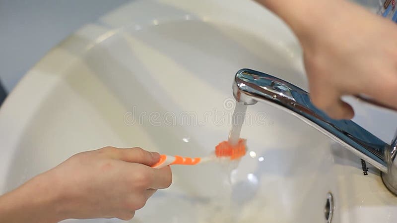 Smiling Little Girl Brushing Teeth in Bath Stock Footage - Video of ...