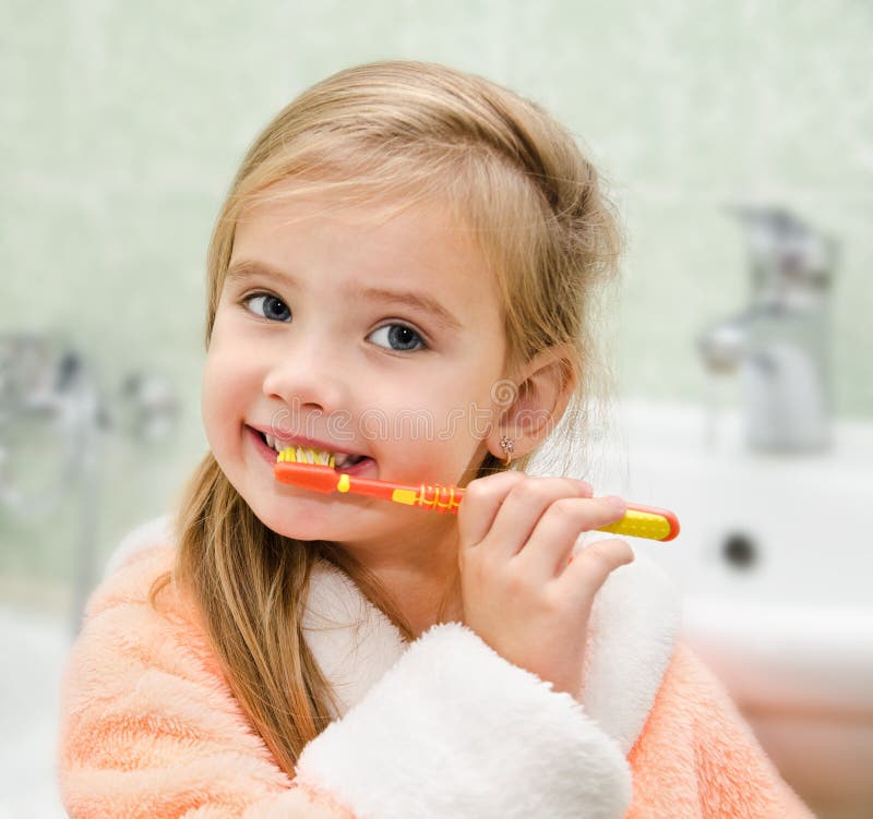Cute Little Girl Brushing Her Teeth Stock Photo - Image of brushing ...