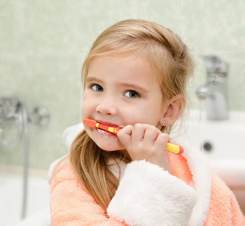 Smiling Little Girl Brushing Teeth in Bath Stock Image - Image of ...