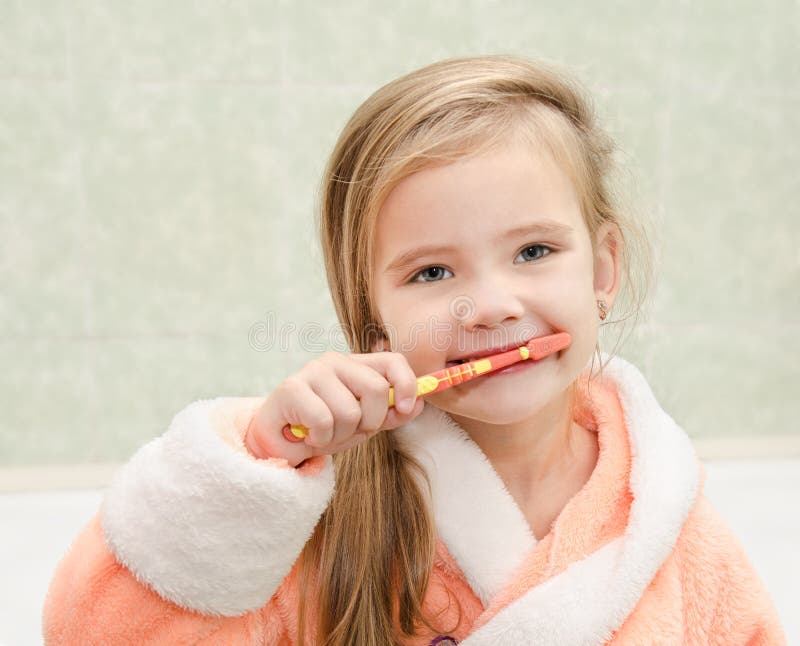 Smiling Little Girl Brushing Teeth in Bath Stock Photo - Image of ...