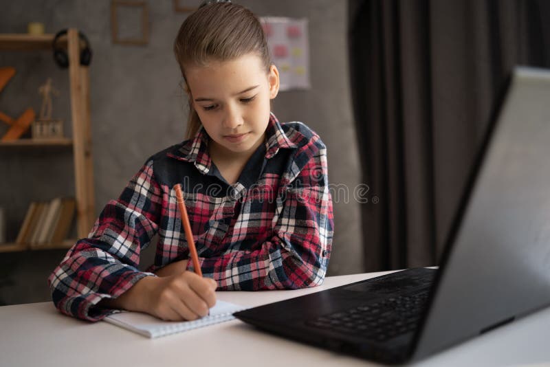 Smiling Little Girl Handwrite Study Online, Using Laptop at Home, Small ...