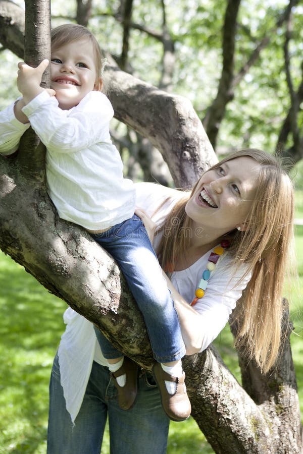 Little Kids - Girls Standing on Tree Stock Photo - Image of barefeet ...
