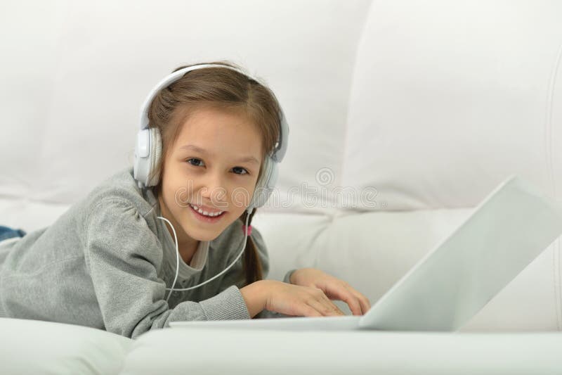 Smiling Little Girl with Laptop Computer Stock Photo - Image of modern ...