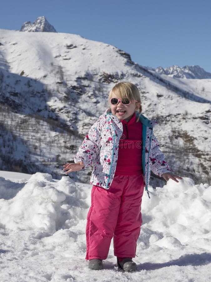 Smiling Little Girl on the Snow Stock Photo - Image of cheerful ...