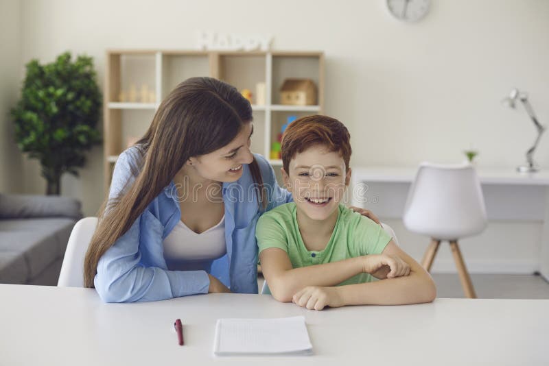Little Boy is Going To Write Down Tasks on a Piece of Paper with the ...