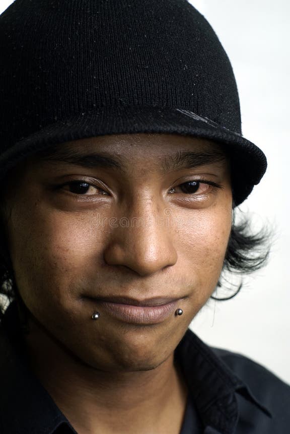 Smiling malay man with hat stock photo. Image of portrait - 5510596