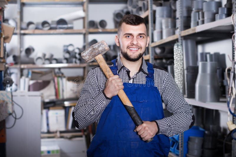 Smiling Male Builder Showing Constructing Instruments Stock Image ...