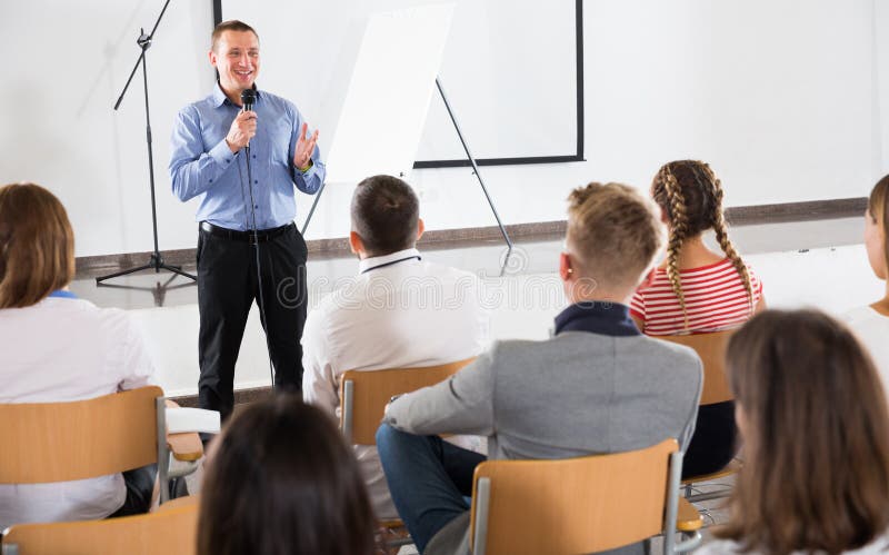 Male Coach Giving Presentation Stock Photo - Image of group, classmates ... Male Coach Giving Presentation Stock Photo - Image of group, classmates ...