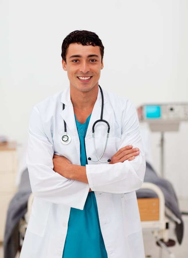 Smiling Male Doctor Standing Stock Image - Image of practitioner ...