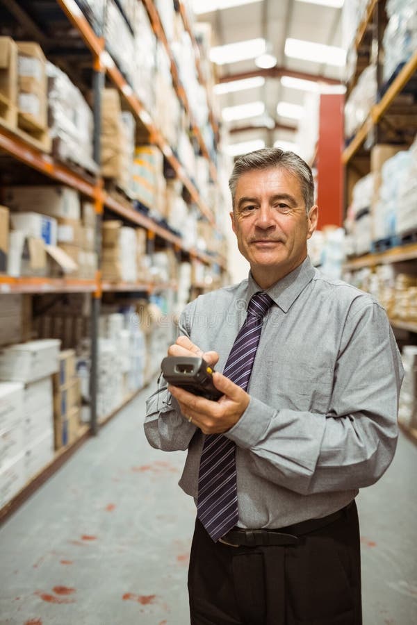 Male Manager Relaxing with Feet Up while Using Mobile Phone at Desk ...