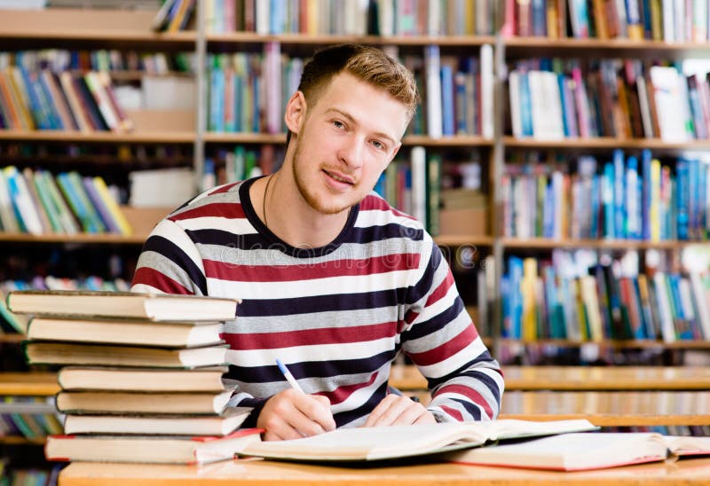 Student with Open Textbook Deep in Thought Stock Image - Image of ...