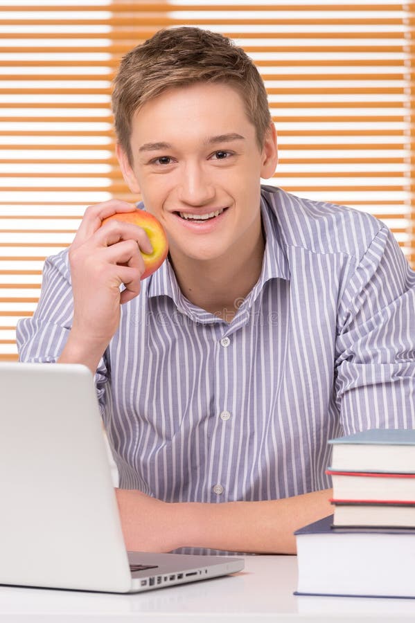Smiling Male Student with Stack of Books. Stock Image - Image of books ...