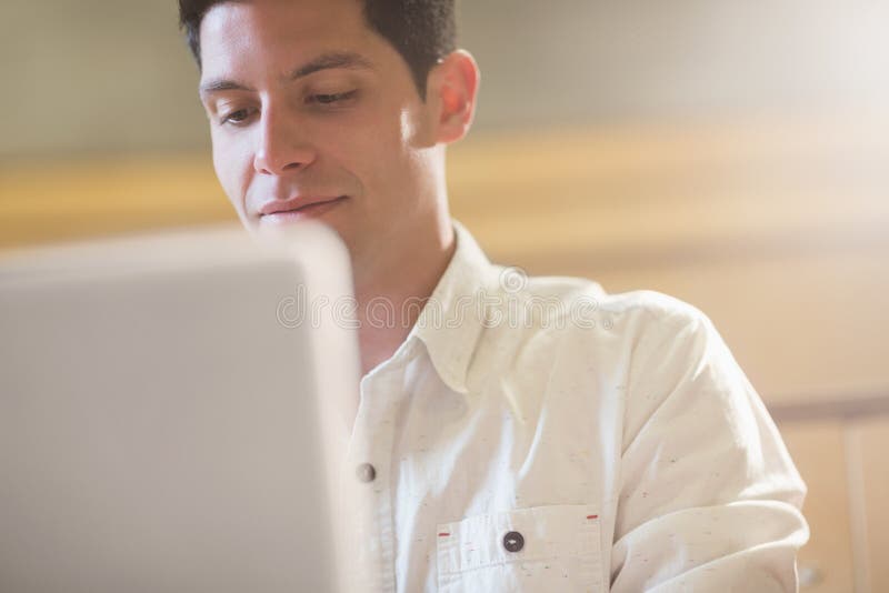 Smiling Male Student Using Laptop Stock Photo - Image of knowledge ...