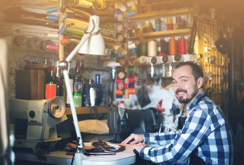 Smiling Male Worker Qualitatively Stitching Belt Stock Photo - Image of ...