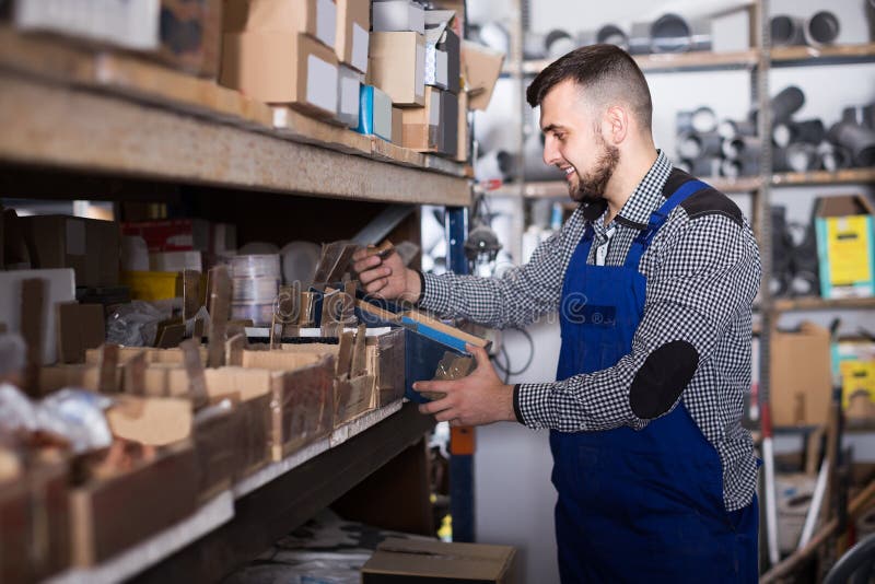 Smiling Male Worker Sorting Sanitary Engineering Details Stock Image ...