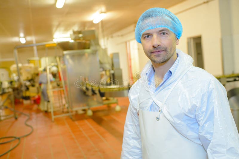 Smiling Male Worker in White Coat on Dairy Processing Factory Stock ...