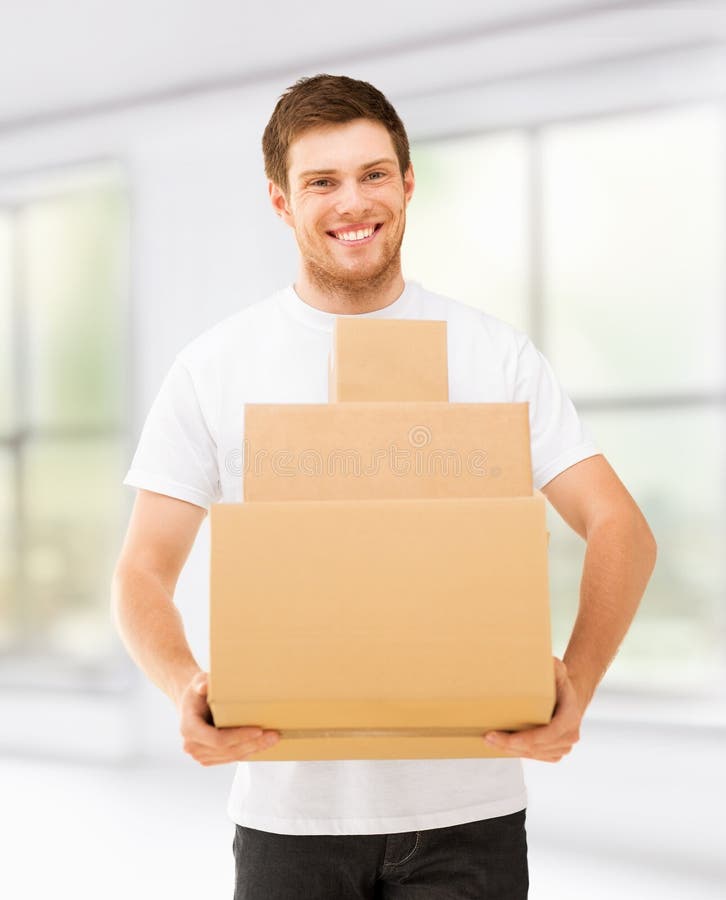 Smiling Man Carrying Carton Boxes at Home Stock Image - Image of ...