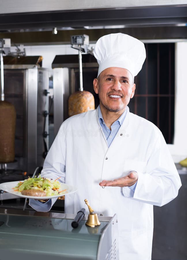 Smiling Man Chef Holding Plate with Freshly Meat in Cafe Stock Image ...