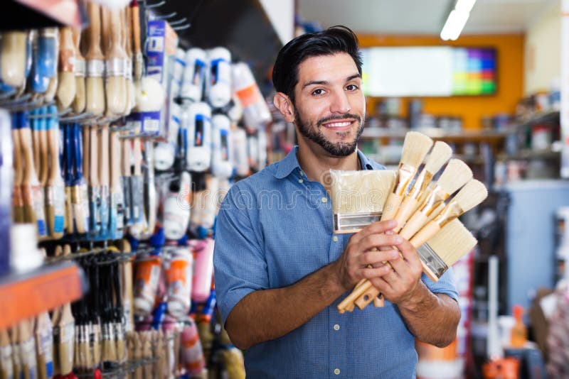 Man Choosing Tools in Store Stock Image - Image of diversity, picking ...