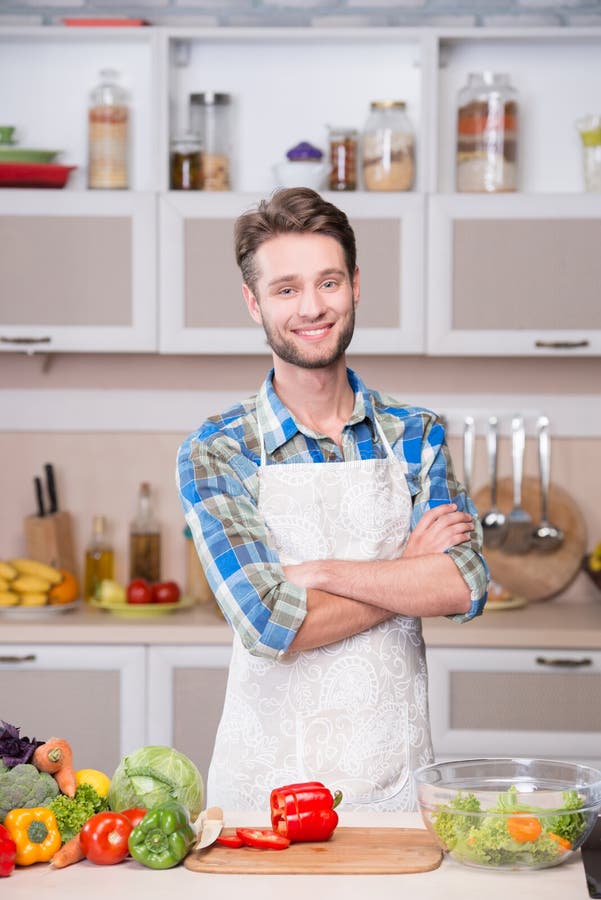 Smiling Man Cooking Dinner in Kitchen Stock Photo - Image of passion ...