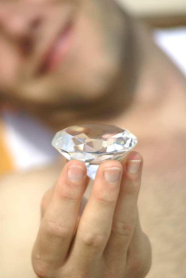 Smiling man with diamond stock photo. Image of vacation - 2328054