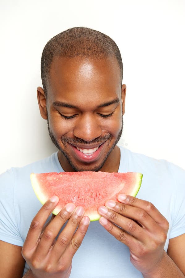 Smiling Man Eating Watermelon Stock Image - Image of eating, cheerful ...