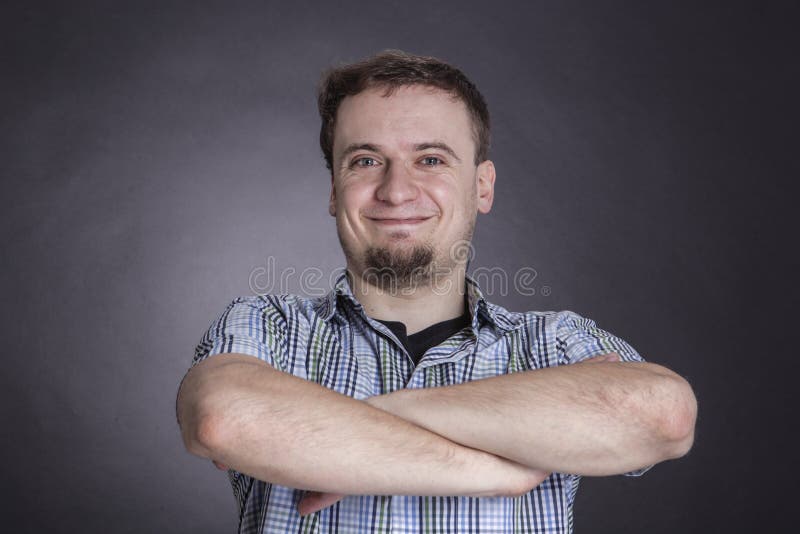 Smiling Man with Folded Hands Stock Photo - Image of plaid, like: 29529914