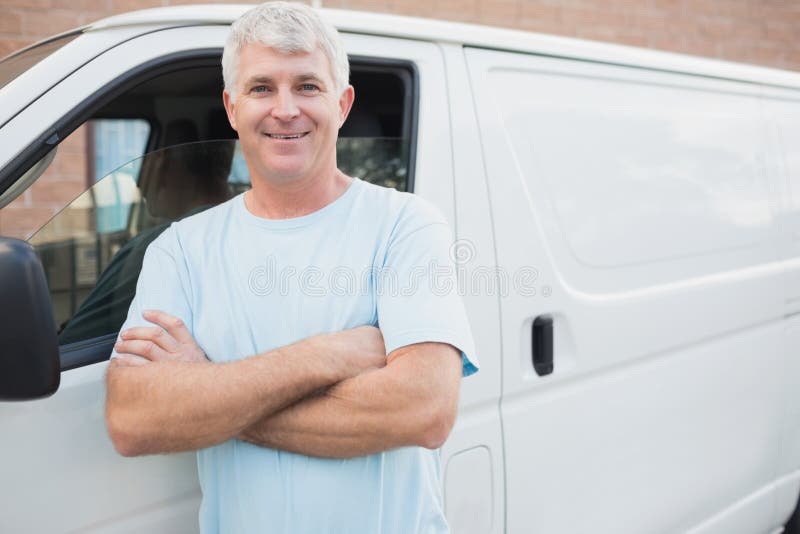 Smiling Man in Front of Delivery Van Stock Image - Image of arms ...