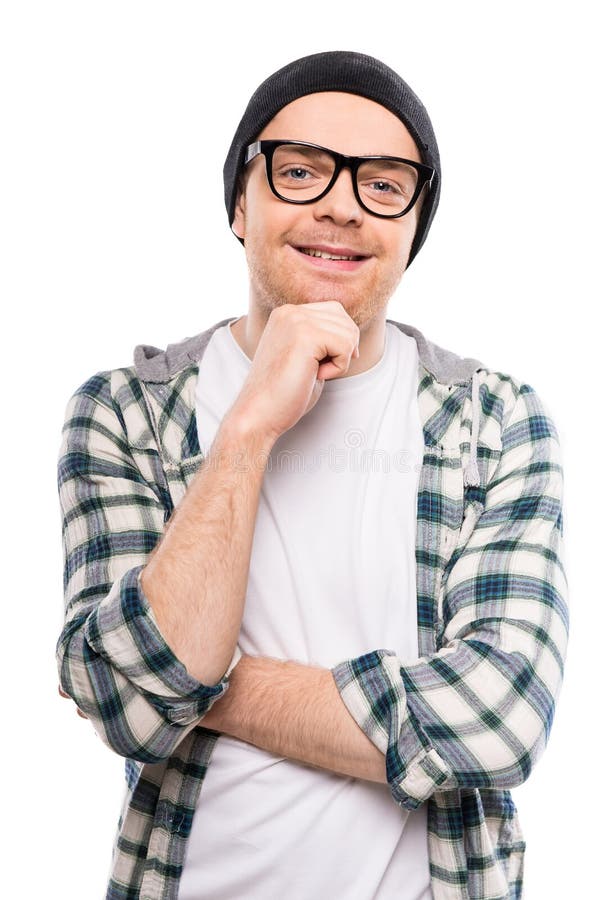Smiling man, Man in glasses looking at camera and smiling. Studio shot ...