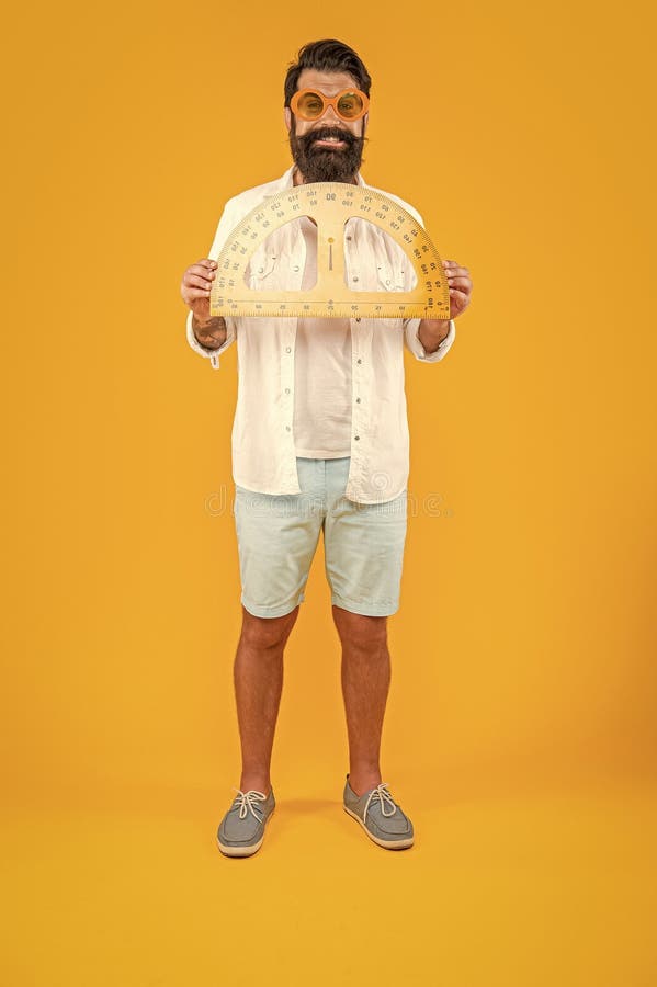 Smiling Man Hold Geometry Protractor Isolated on Yellow. Man Hold ...