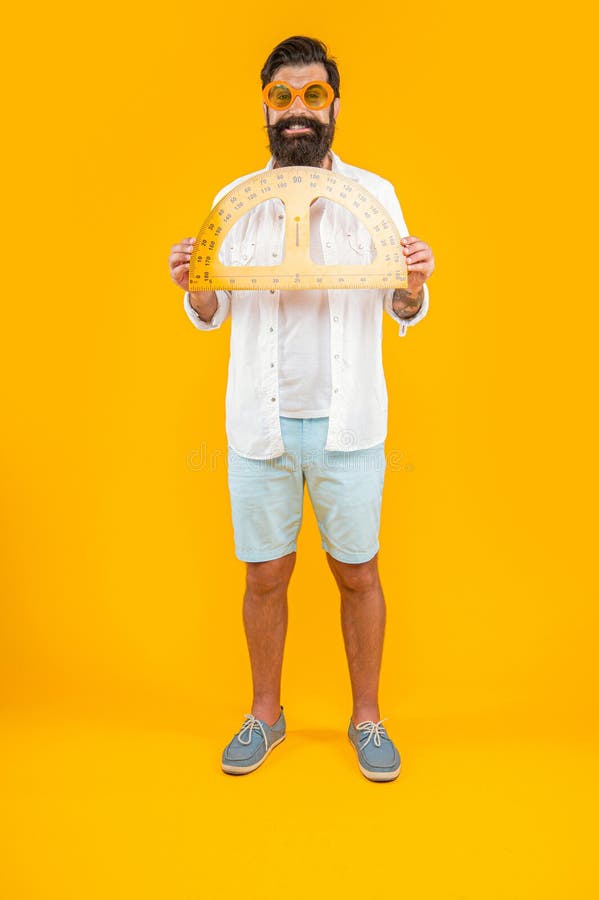 Smiling Man Hold Geometry Protractor Isolated on Yellow. Man Hold ...