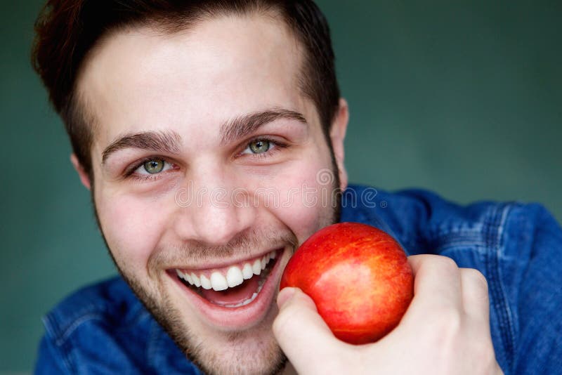 Smiling Man Holding Red Apple Stock Image - Image of caucasian, fresh ...