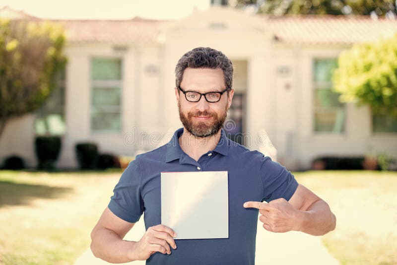 Smiling Man Nerd Pointing Finger on Paper Sheet Presenting ...