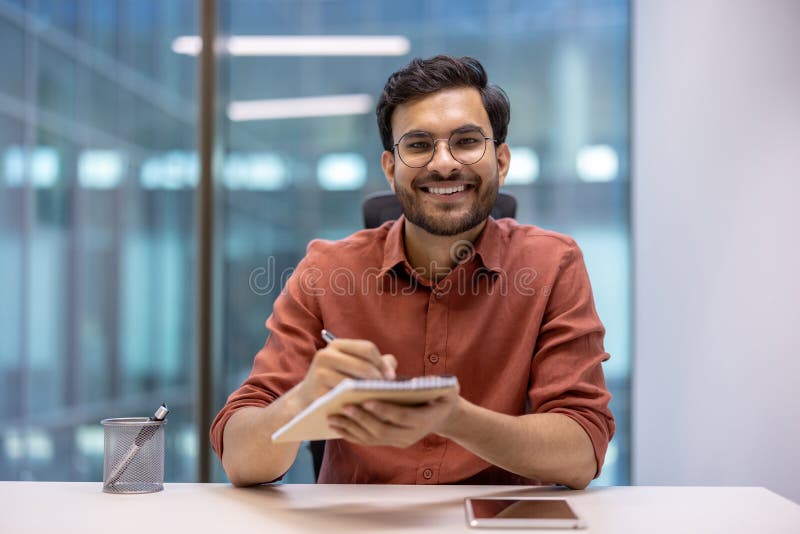 Smiling Man in Office Holding Notebook Ready To Take Notes during ...