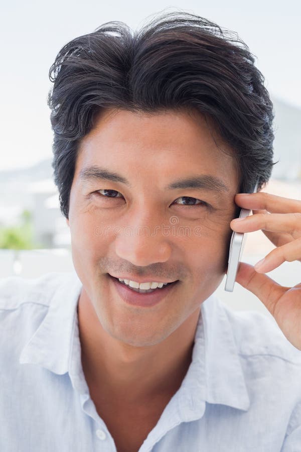 Smiling man on phone call stock image. Image of view - 39430393