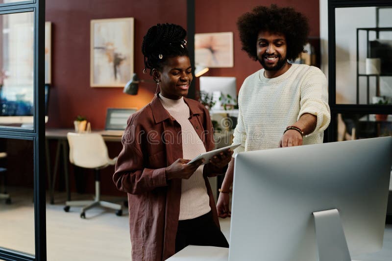 Smiling Man Pointing at Computer Screen Stock Image - Image of engineer ...