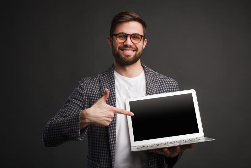 Smiling Man Pointing at Laptop Stock Image - Image of contemporary ...