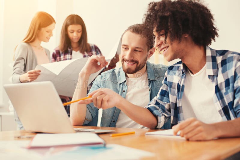Smiling Man Pointing at the Screen with His Pencil Stock Image - Image ...